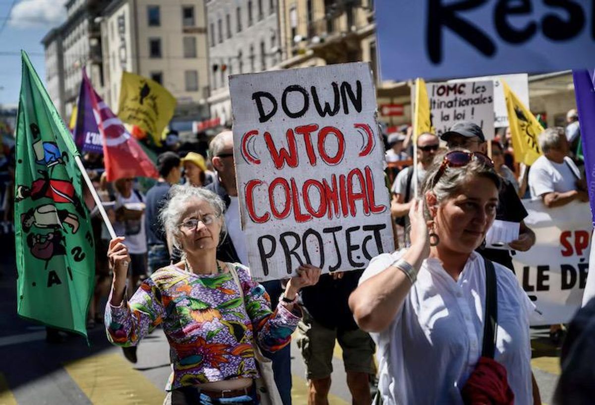 Protesters march in Geneva against WTO role in agriculture - Raw Story