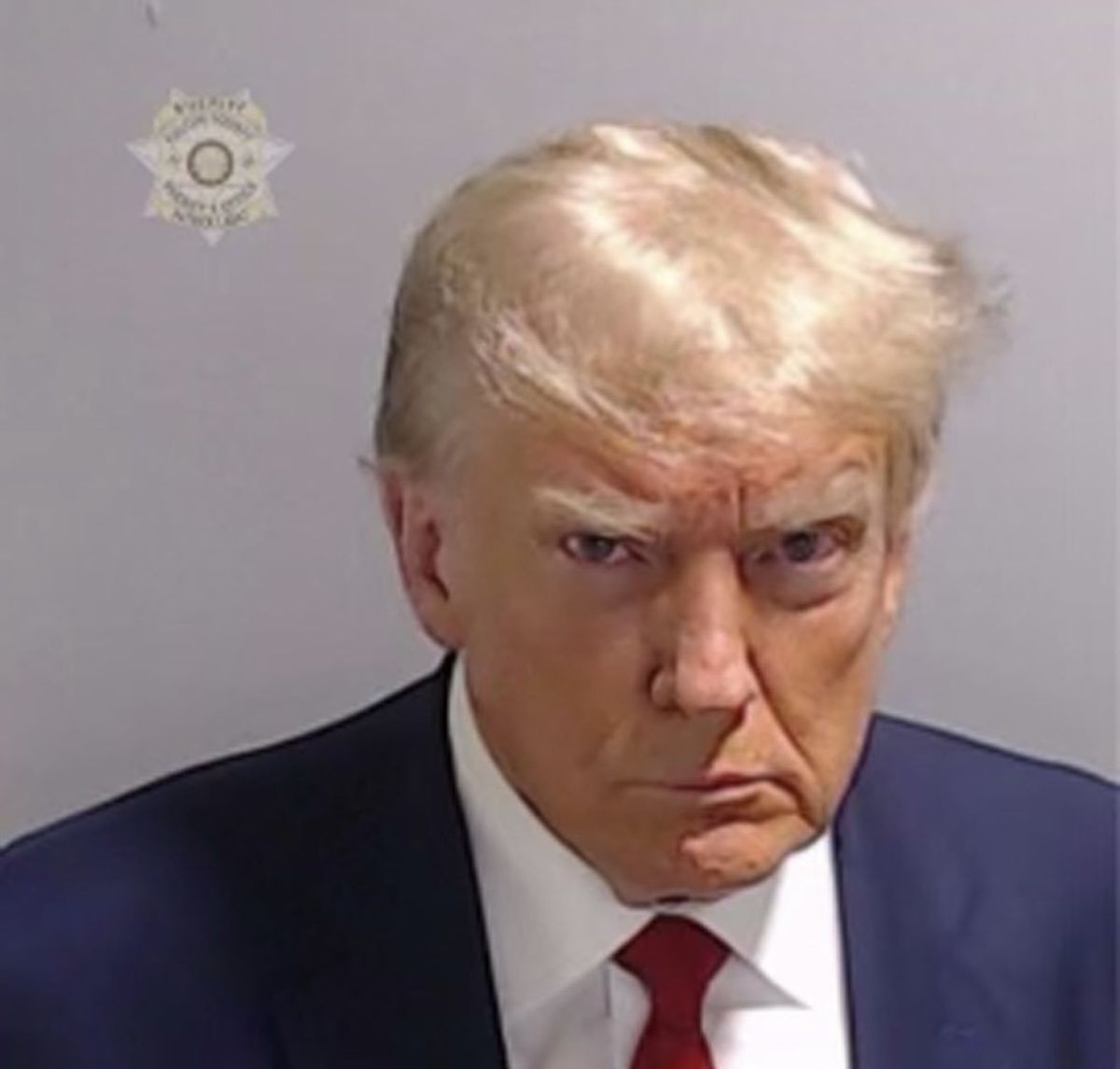 'Emperor has no clothes': Trump mugshot explodes across the internet ...