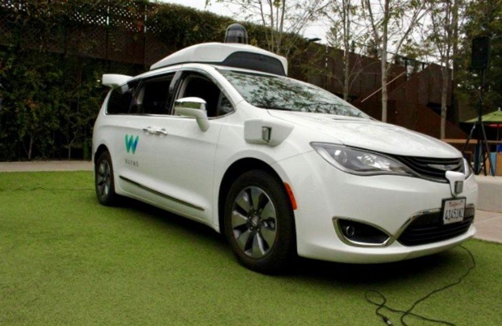 Waymo opens robo-taxi service to the public in Phoenix - Raw Story ...