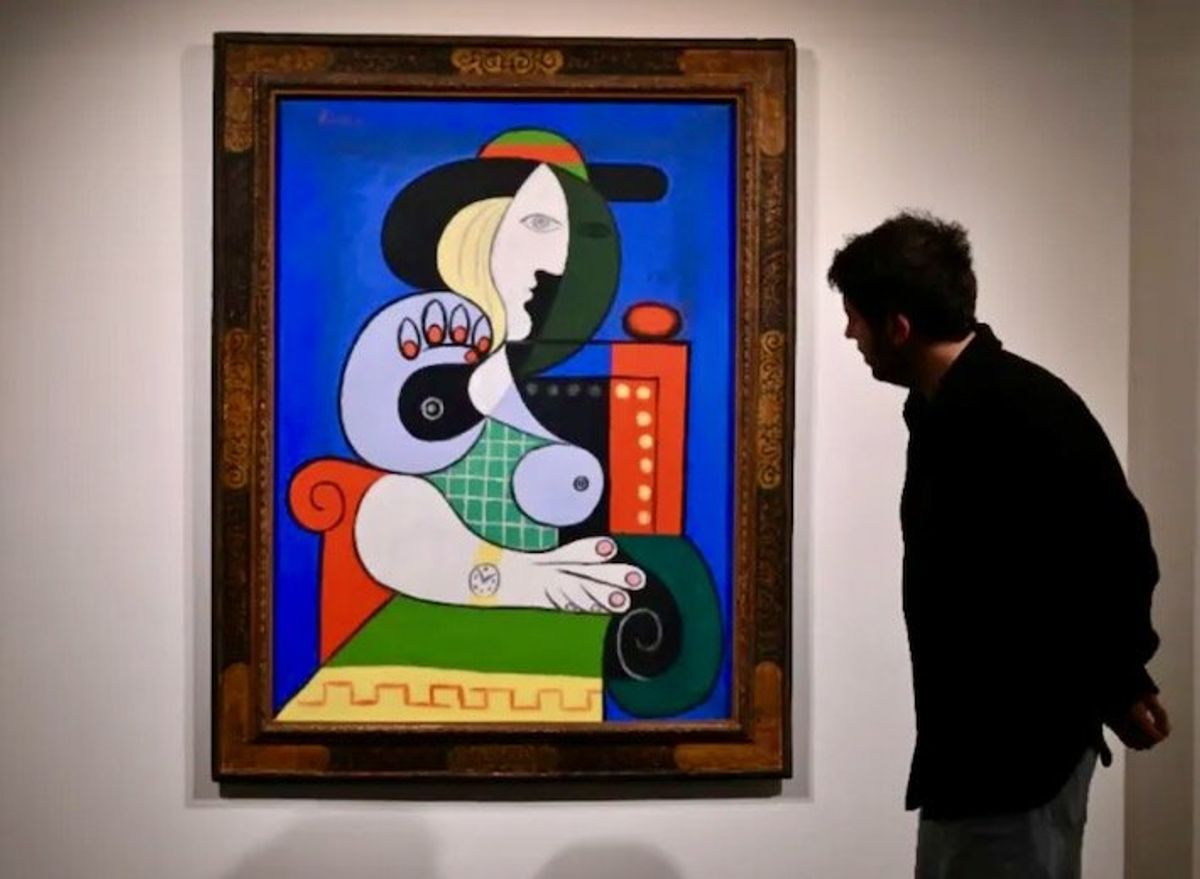 Picasso's 'Woman with a Watch' fetches $139 million at N.Y. auction ...