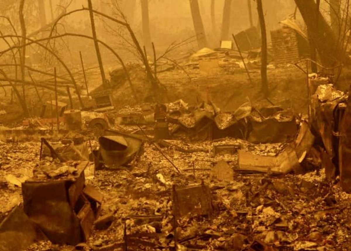Year's largest fire burns through dry terrain to destroy California ...